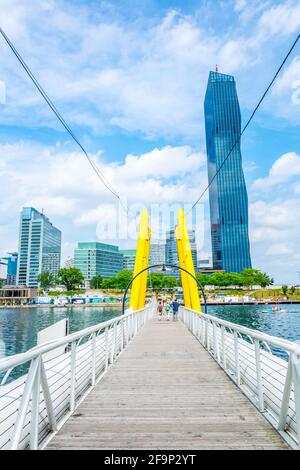 View of a floating bridge over danube river near VIC and Donauturm ...