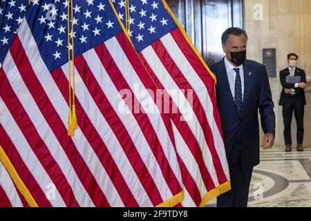 Sen. Mitt Romney, R-Utah, walks to a vote, Tuesday, Oct. 19, 2021, on ...