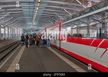 Passenger shuttle train in terminal at modern Hamad International ...