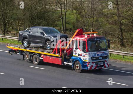 A Ford Cargo recovery truck Stock Photo - Alamy