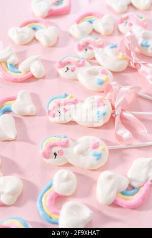 Gourmet unicorn theme meringue pops on a pink background Stock Photo ...