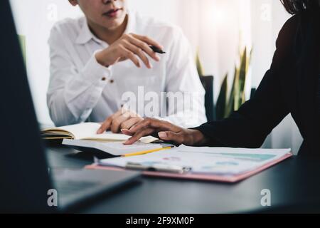 Group of Businesswoman and Accountant checking data document on digital ...