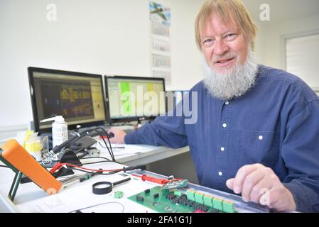 engineer at the workplace - assembly and development of electronics in ...