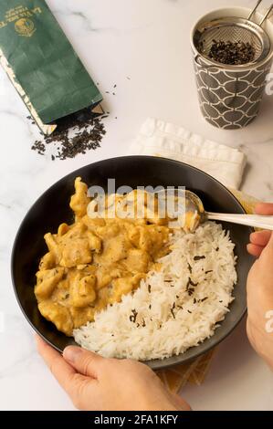 A savory bowl of traditional Indian Thai chicken curry. This vibrant ...