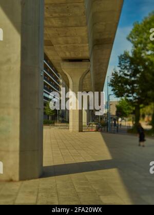 A woman walks in the sun in London, Tuesday, June 23, 2026, as a heat ...