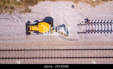 Railroad workers repairing a broken track Stock Photo - Alamy