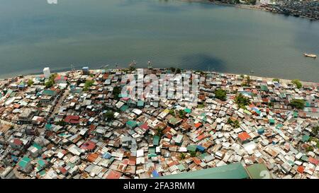 Slums in Manila, a top view. Sea pollution by household waste. Plastic ...
