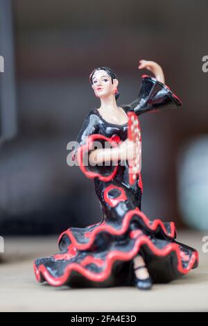 spanish girl flamenco dancer on a gray background Stock Photo - Alamy