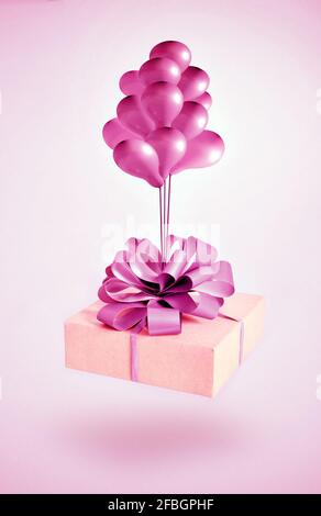 Gift box concept on pink background with copy space Stock Photo - Alamy