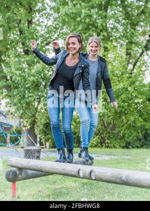 a woman having fun at the playground for adults Stock Photo - Alamy