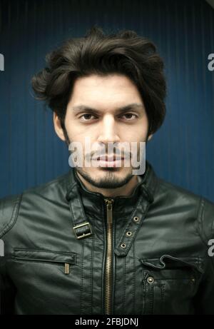 portrait of a handsome man in a leather jacket Stock Photo - Alamy