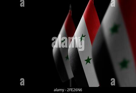 Small national flags of the Syria on a black background Stock Photo - Alamy