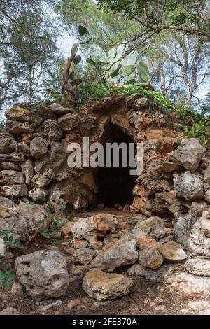 Archeological grotto in the forest Stock Photo - Alamy