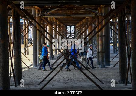 People walk on the pier, Saturday, Feb. 12, 2022, Santa Monica, Calif ...