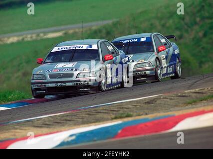 Volvo S40 of Rickard Rydell and Vincent Radermecker nose to tail racing ...