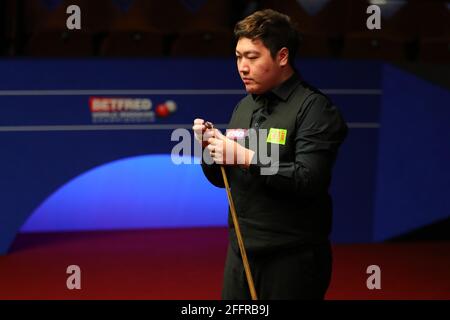 Sheffield, Britain. 24th Apr, 2021. China's Yan Bingtao competes during ...