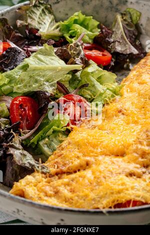 Rustic omelette with vegetables salad Stock Photo - Alamy