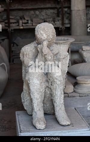 Italy. Pompeii. Plaster cast of human remains Stock Photo - Alamy