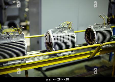 The stator of an industrial electric motor at the assembly stage. Thick ...