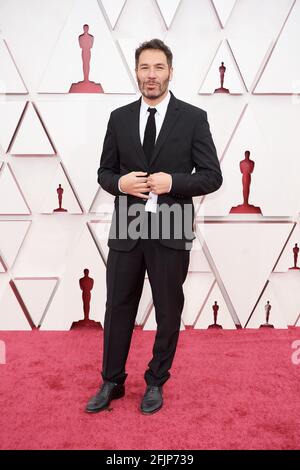 Dan Swimer arrives at the Oscars on Sunday, April 25, 2021, at Union ...
