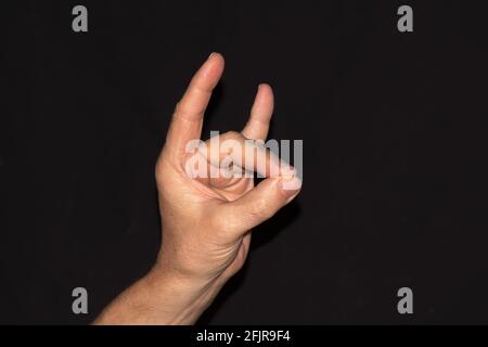 Muslim hand sign Stock Photo - Alamy