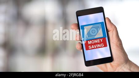 Smartphone screen displaying a money saving concept Stock Photo - Alamy