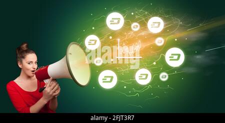 Young person with megaphone and currency icon Stock Photo - Alamy