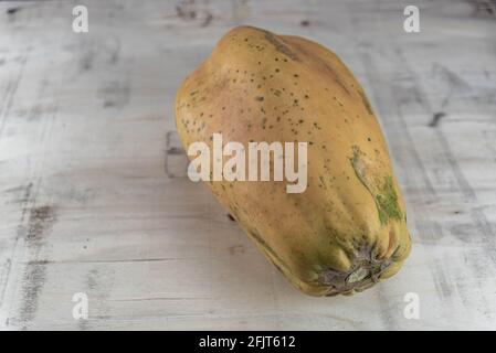 Formosa variety papaya fruit on wooden background. Papaya Formosa ...