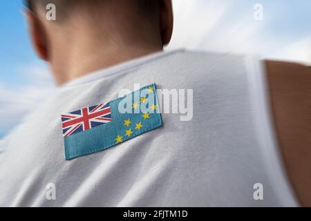 The national flag of Tuvalu on the athlete's chest Stock Photo - Alamy