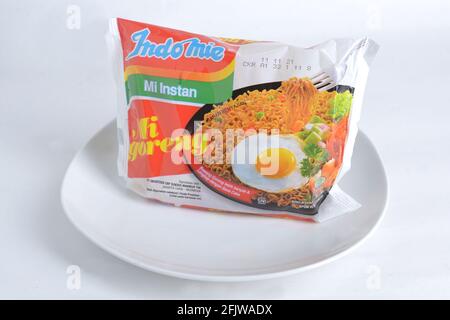 Raw Instant fried Noodles, with packaging brand, Indomie, Mie instant ...