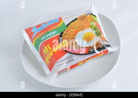 Raw Instant fried Noodles, with packaging brand, Indomie, Mie instant ...