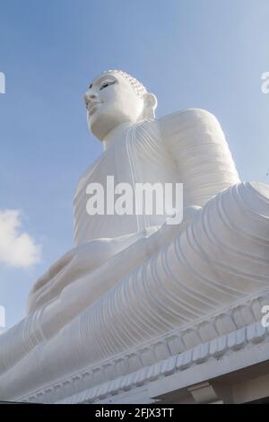 The giant Bahiravokanda Vihara Buddha Statue illuminated at night at ...