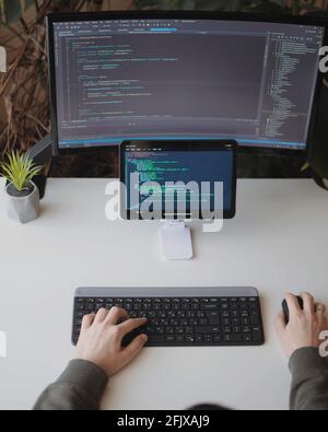 Working coding program at home Stock Photo - Alamy