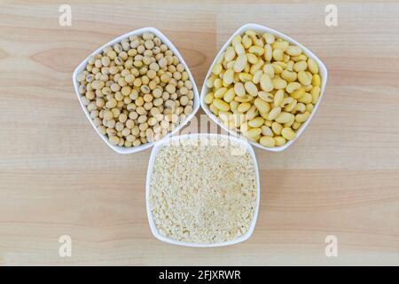 Dried soya powder, roasted ground soy bean flour powder in white bowl ...