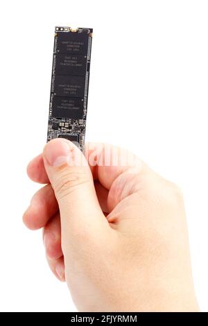 Caucasian hand holding NVME M.2 SSD 2280 3Dnand SLC drive stick ...