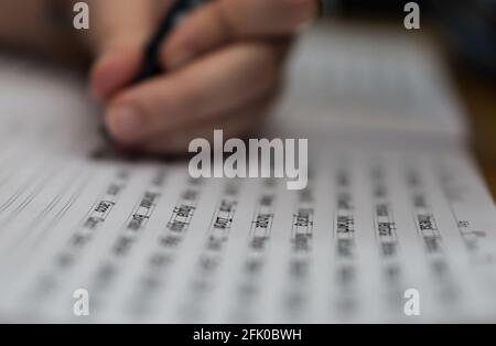 School homework in paper, selective focus Stock Photo - Alamy