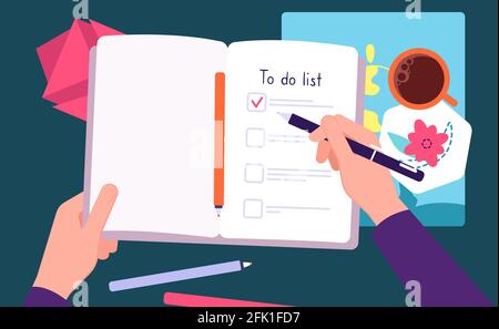 Hand holding pencil and fill check mark on to do lists paper sheet with ...