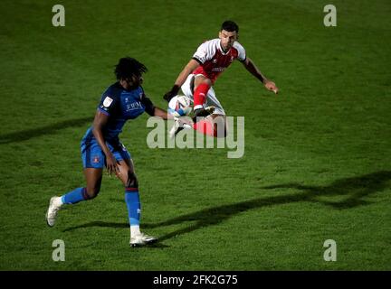 Carlisle United's Joshua Kayode (left) and Cheltenham Town's Conor ...