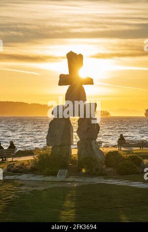 Inukshuk In English Bay At Dusk, Vancouver, British Columbia, Canada ...