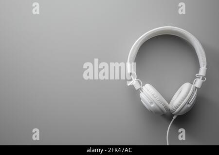 Stereo headphones. Top view of white headphones on white background ...