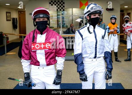 Jockeys Ellie Mackenzie (left) and Grace McEntee wait in the weighing ...