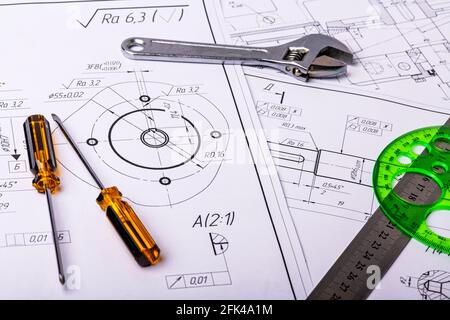 Several Technical engineering drawings, which show mechanical parts ...