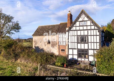Anglo Saxon house built of timber with thatched roof and mud daub walls ...