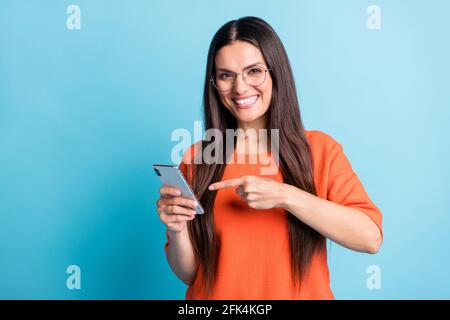 Photo of adorable positive girl toothy smile arms demonstrate heart ...