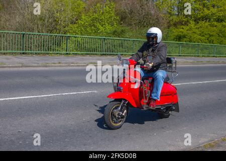 2015 red Scomadi Turismo Leggera 125; Retro style Motorbike rider; two ...