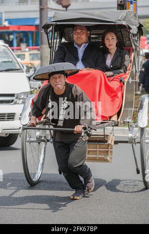 Portrait of a smiling Japanese rickshaw puller, Kyoto, Japan Stock ...