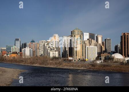Calgary skyline along west end of downtown. New West Village Towers on ...