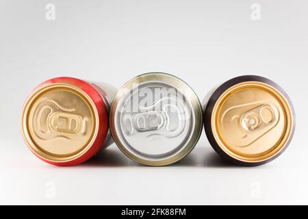 three metal cold cans with beer on a white background Stock Photo - Alamy