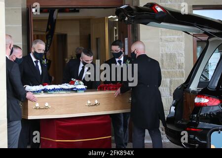 The coffin is lifted from the hearse at Stirling Crematorium, for the ...