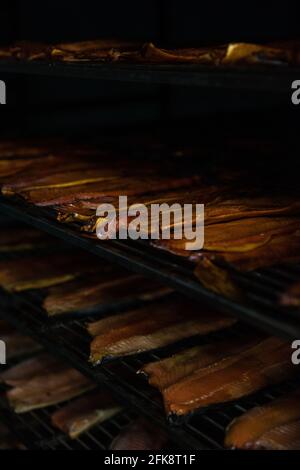 Smoked fish production concept Stock Photo - Alamy